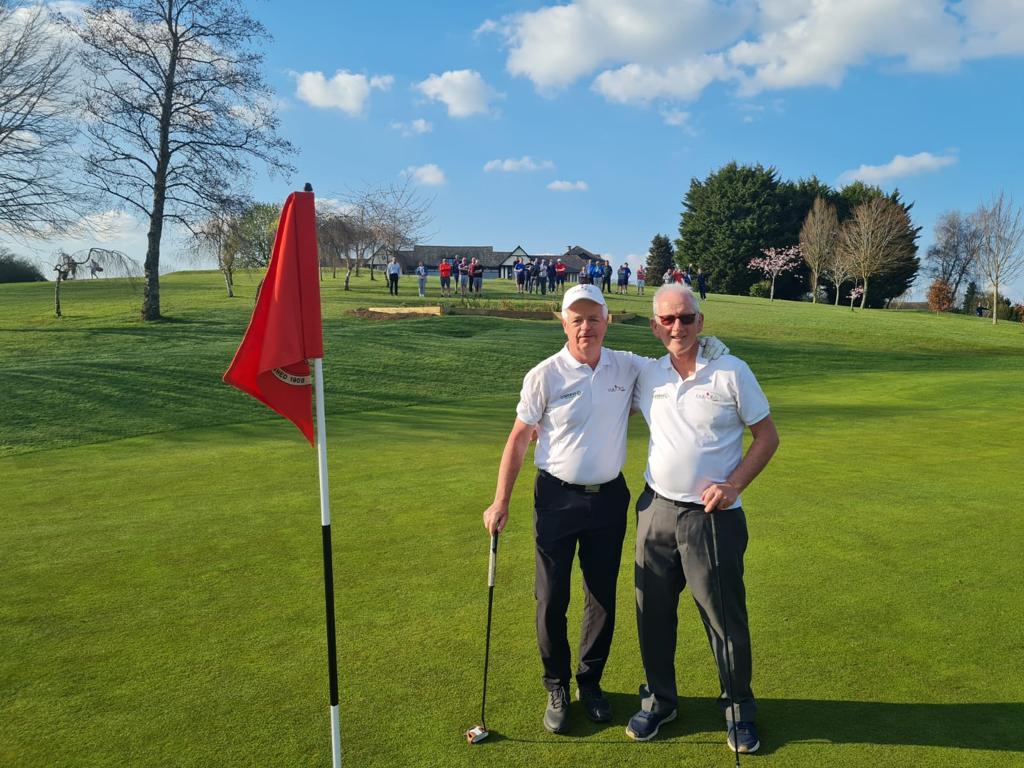 Golfing duo raise thousands for Warwick children's charity - The ...
